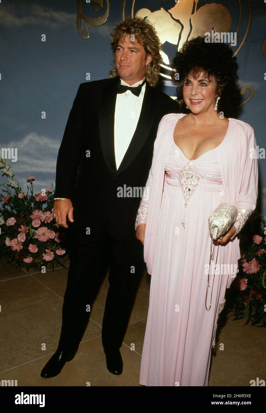 Elizabeth Taylor and Larry Fortensky at the 1990 Carousel of Hope Ball ...