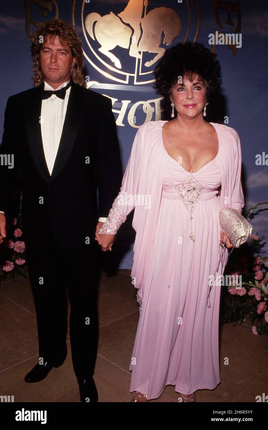 Elizabeth Taylor and Larry Fortensky at the 1990 Carousel of Hope Ball ...