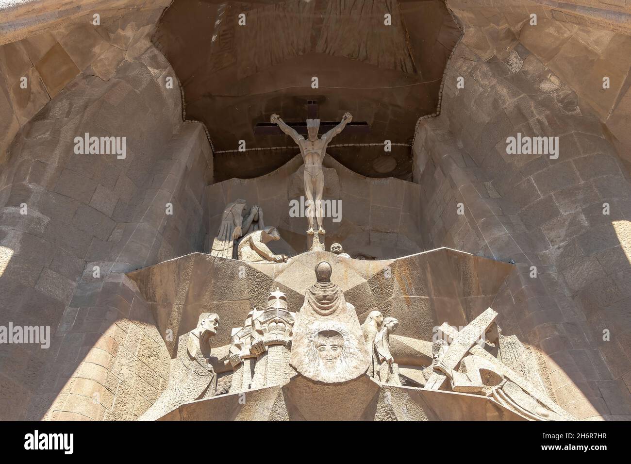 Detail of Christ crucified on the facade of sacred family "La Sagrada Familia" , cathedral ...