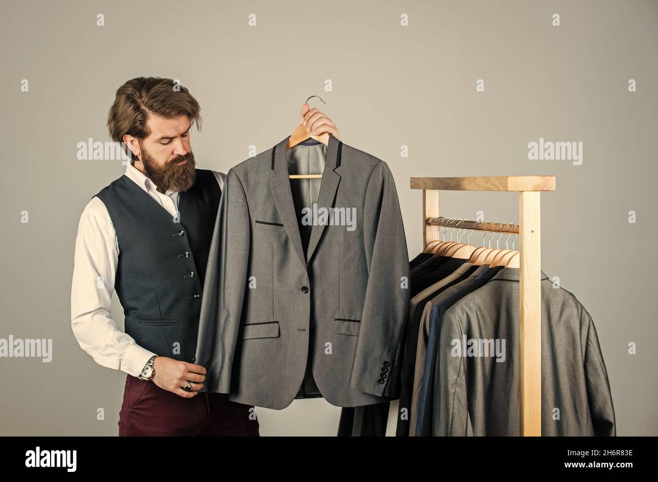 Shopper hipster man in fitting room menswear store, good purchase ...