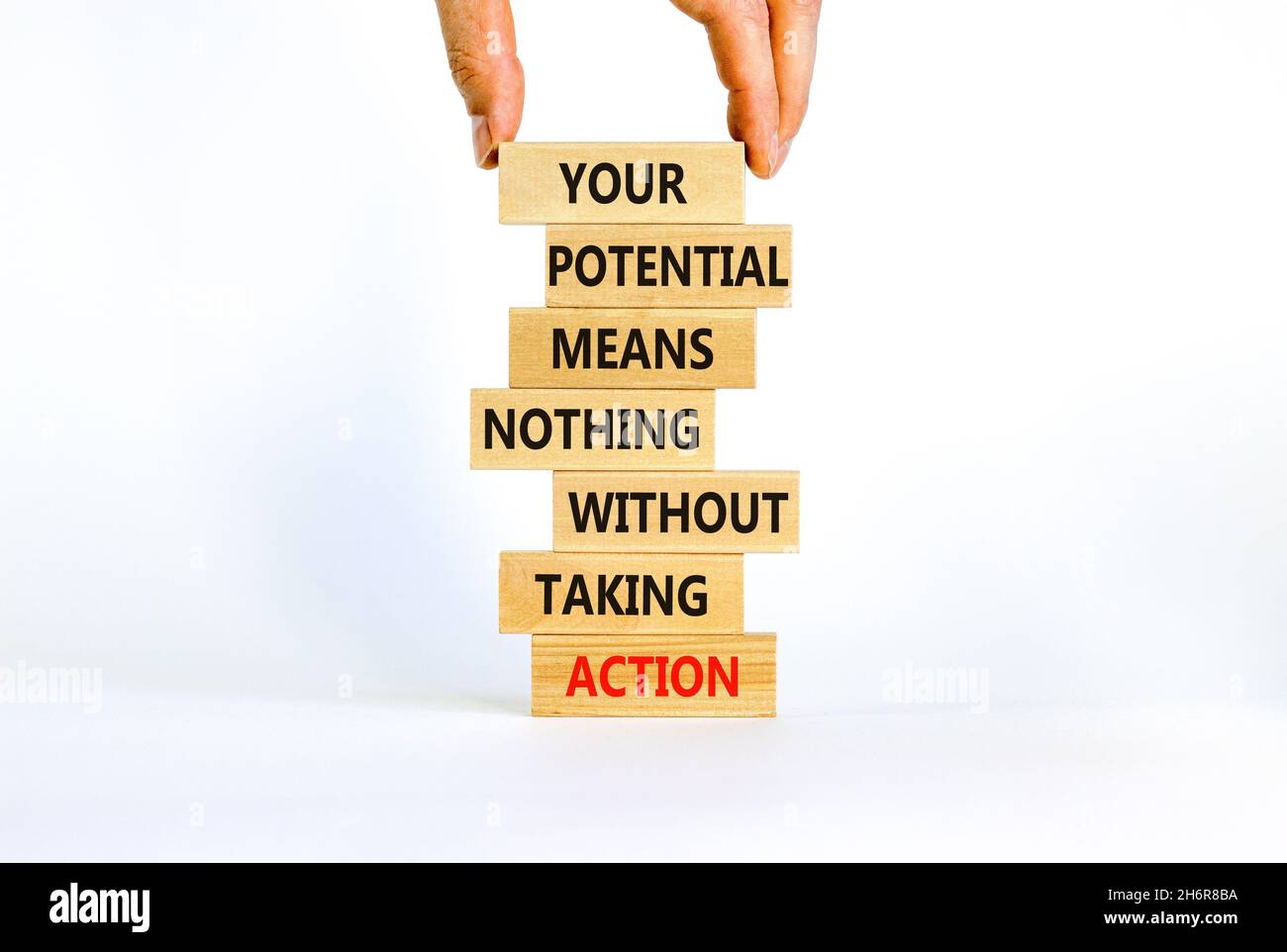 Potential in action symbol. Wooden blocks with words Your potential ...
