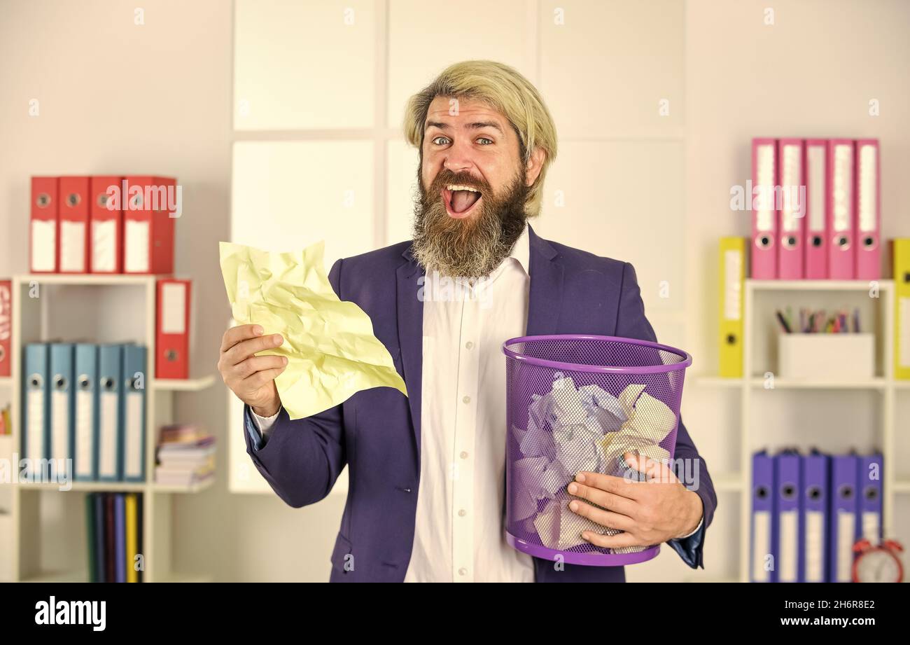 lost info paper. man search crimpled paper in basket. ceo in messy ...