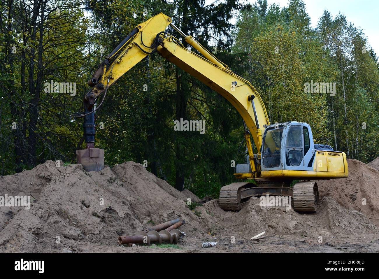 Excavator with Vertical tamrock pile foundation drilling machine. Drill ...