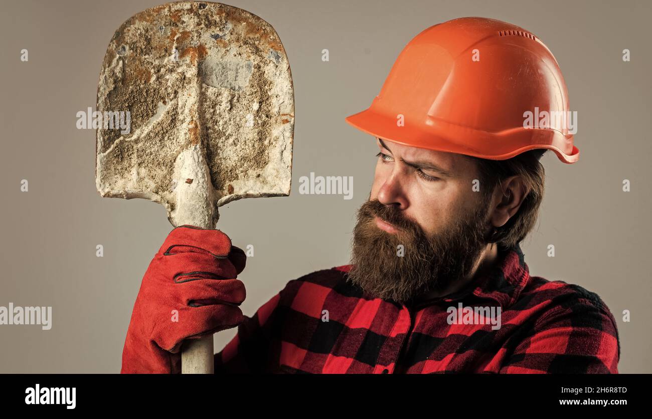 Repair concept. brutal mature hipster wear checkered shirt and hard hat ...