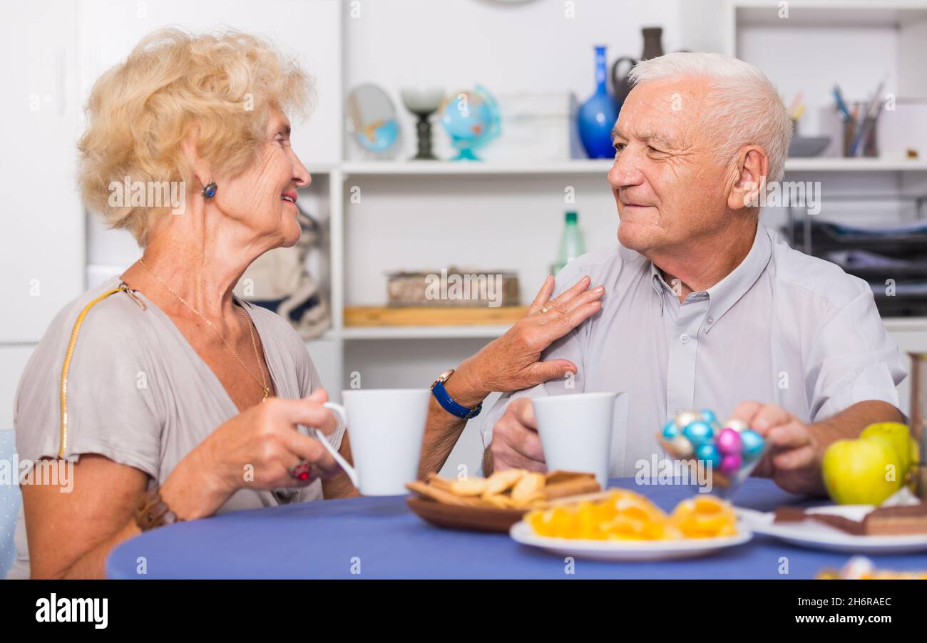 Happy senior couple enjoying conversation over cup of coffee Stock ...