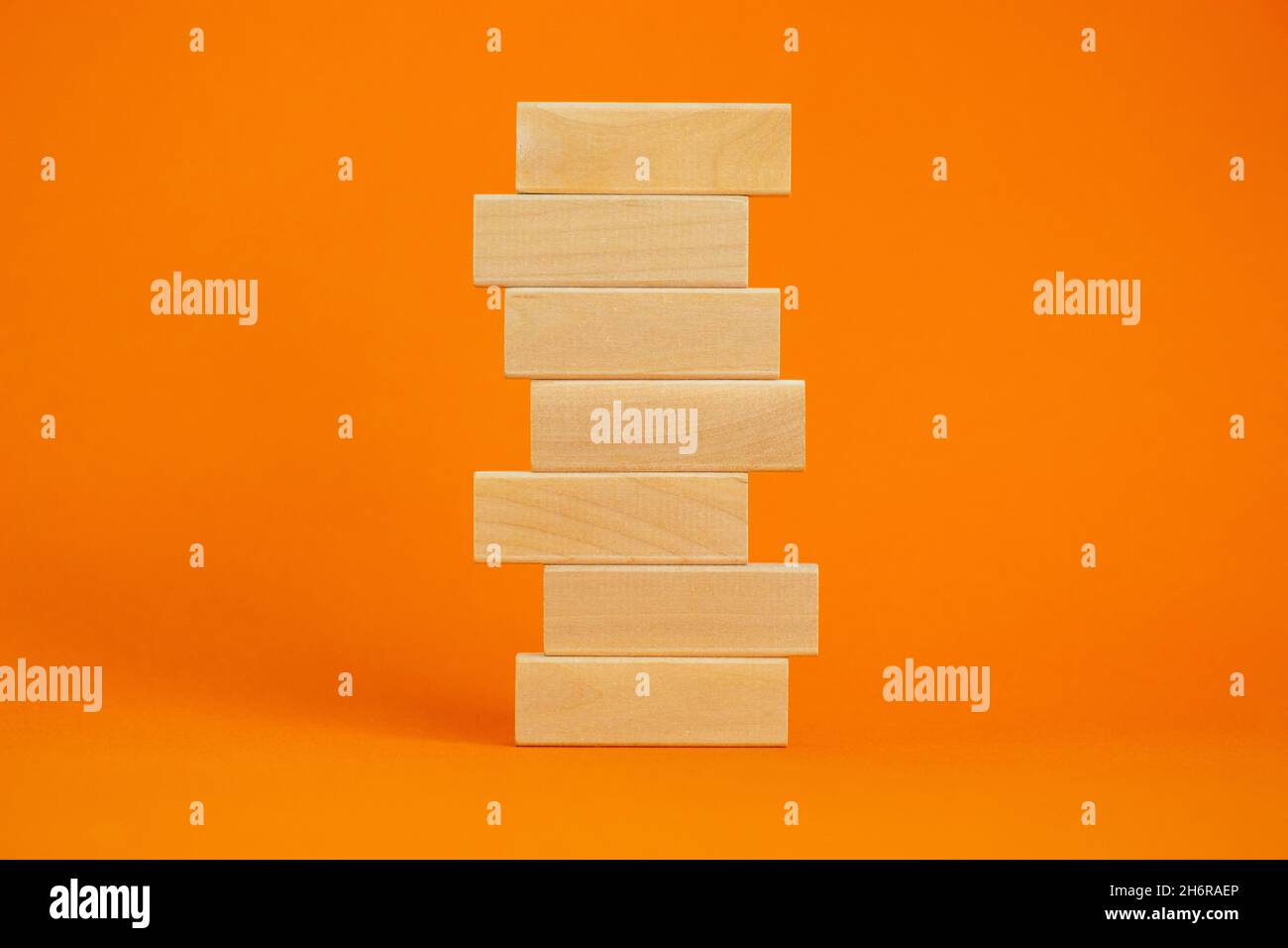 Symbol of building success foundation. Wooden blocks on the stack of ...