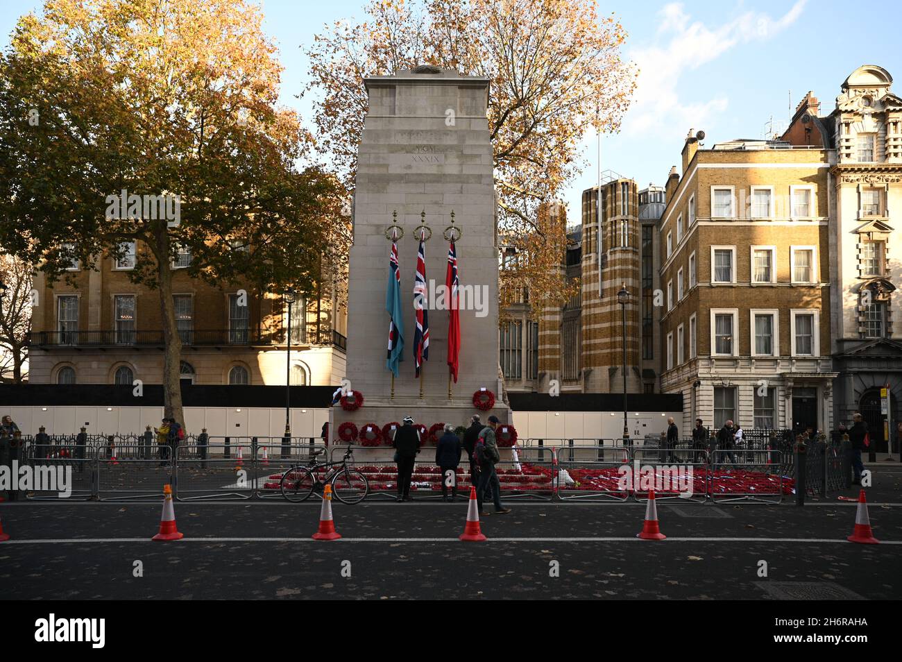 People looking at the cenotaph following the Remembrance Sunday service ...