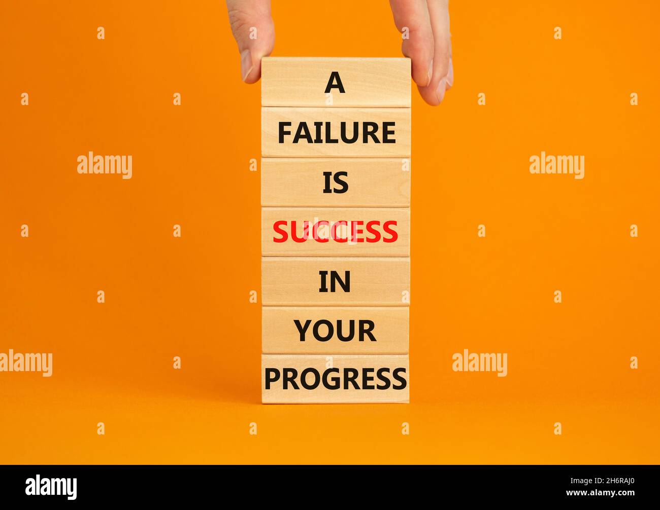 Failure or success symbol. Wooden blocks with words A failure is ...