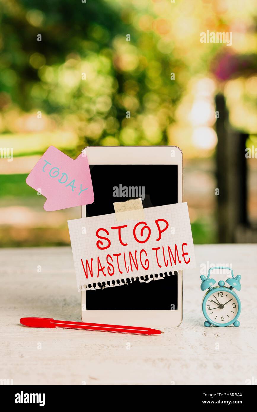 Stop wasting time sign hi-res stock photography and images - Alamy