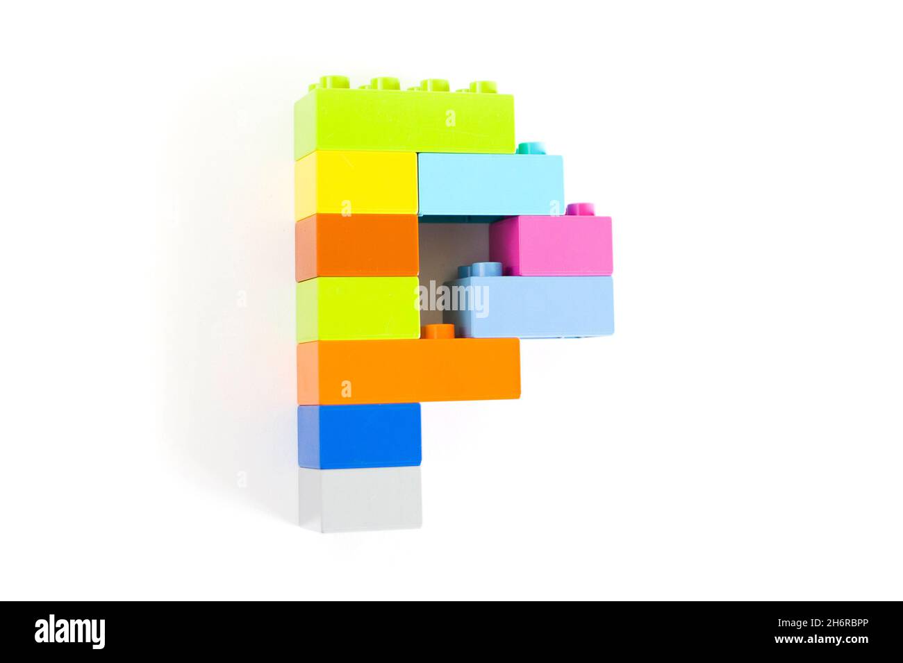 Colorful toy brick letter P isolated on the white background Stock ...