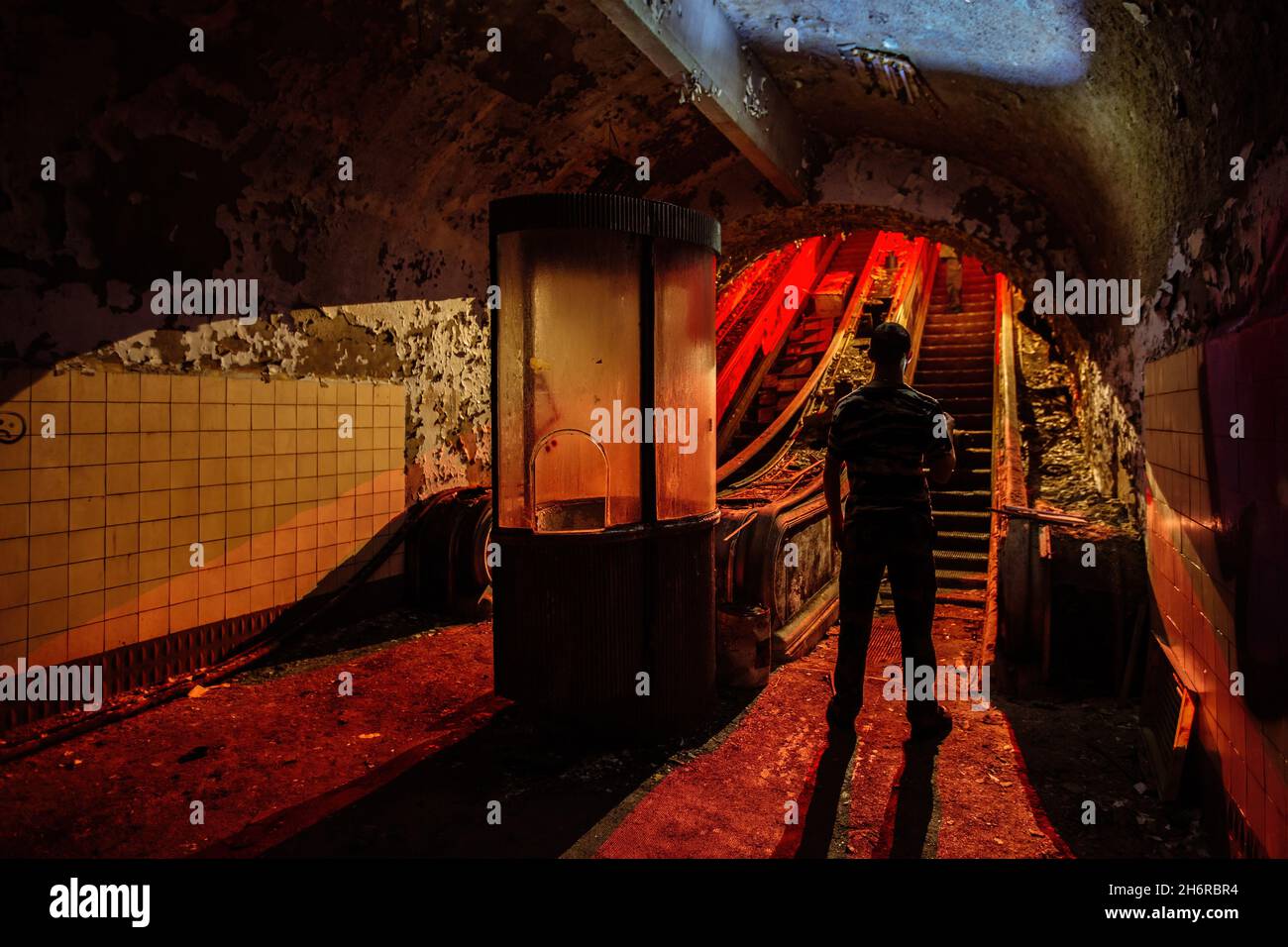 Urban explorer in dark and creepy old abandoned subway station Stock ...