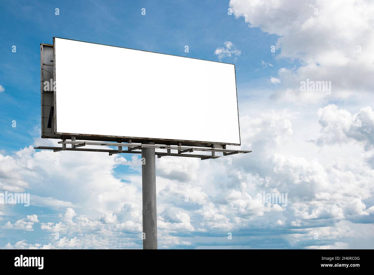Empty Blank billboard mockup with white screen against cloudy sky ...