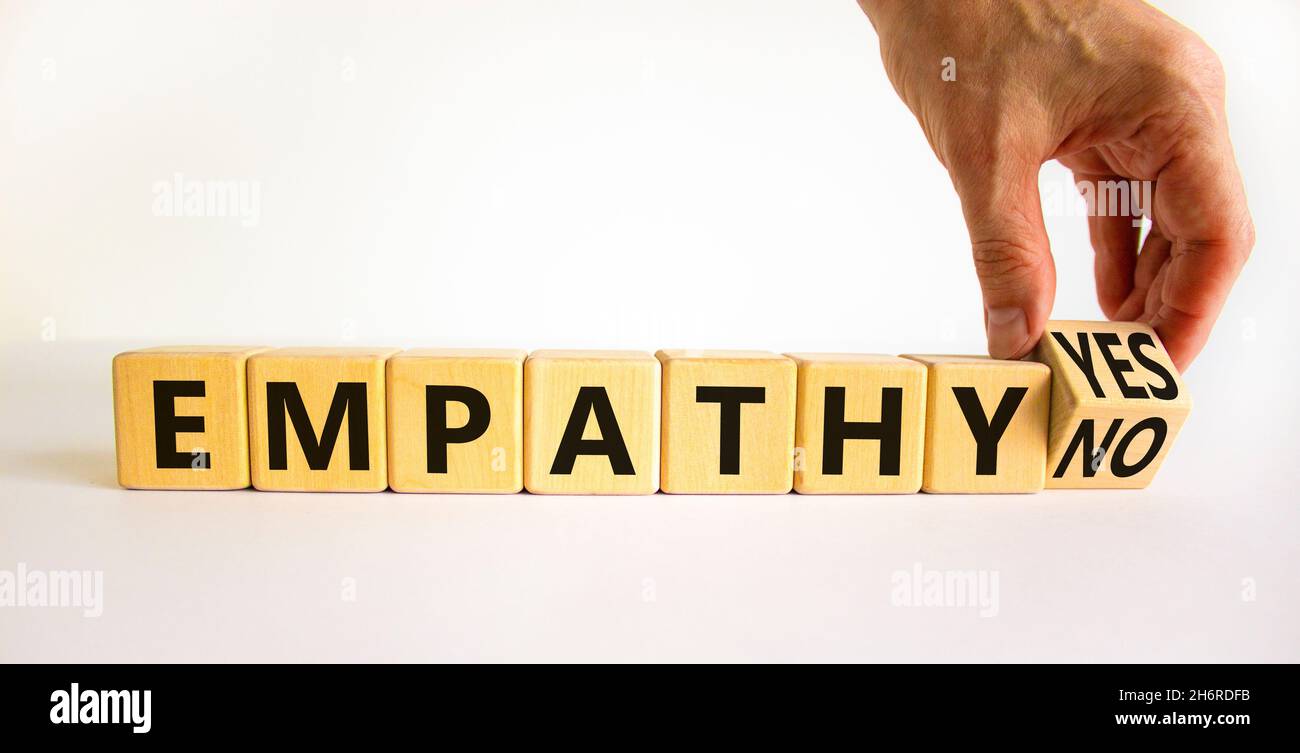 Empathy yes or no symbol. Psychologist turns wooden cubes and changes ...