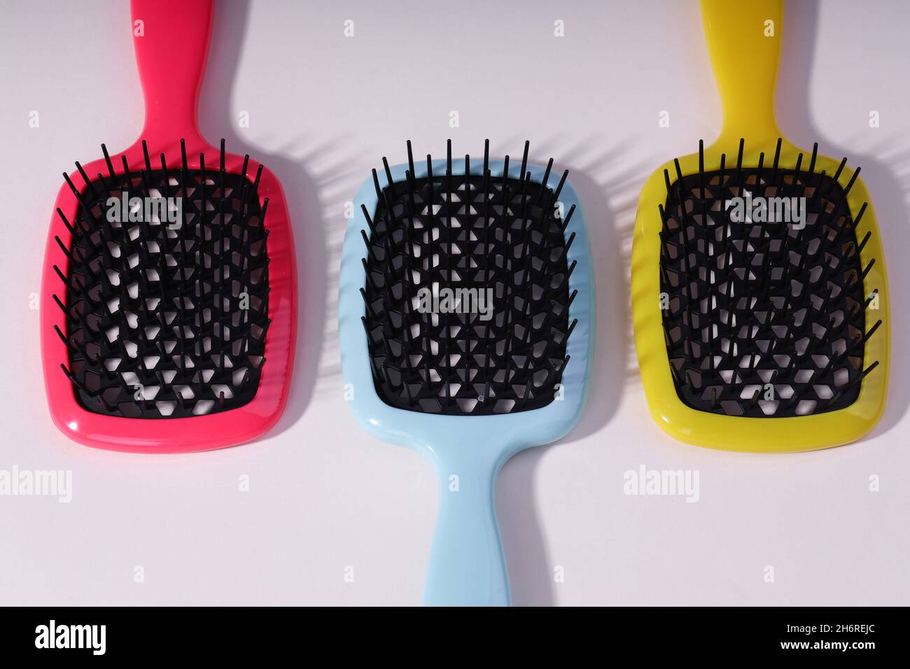 Bright hair brush an white background Stock Photo - Alamy