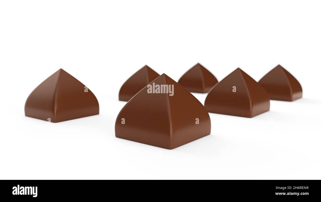 Pyramid shaped chocolate candies isolated on a white background Stock ...
