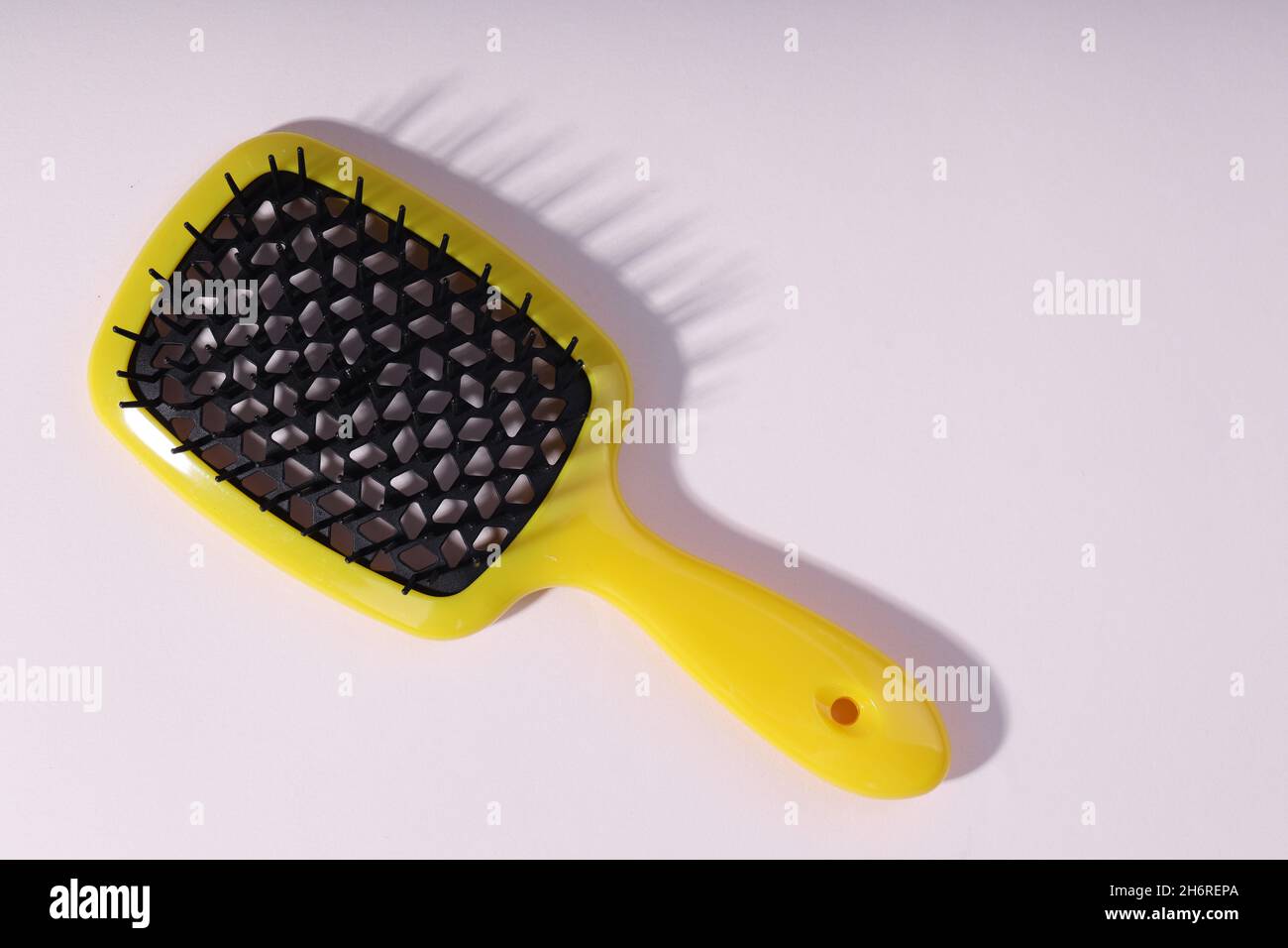 Bright hair brush an white background Stock Photo - Alamy