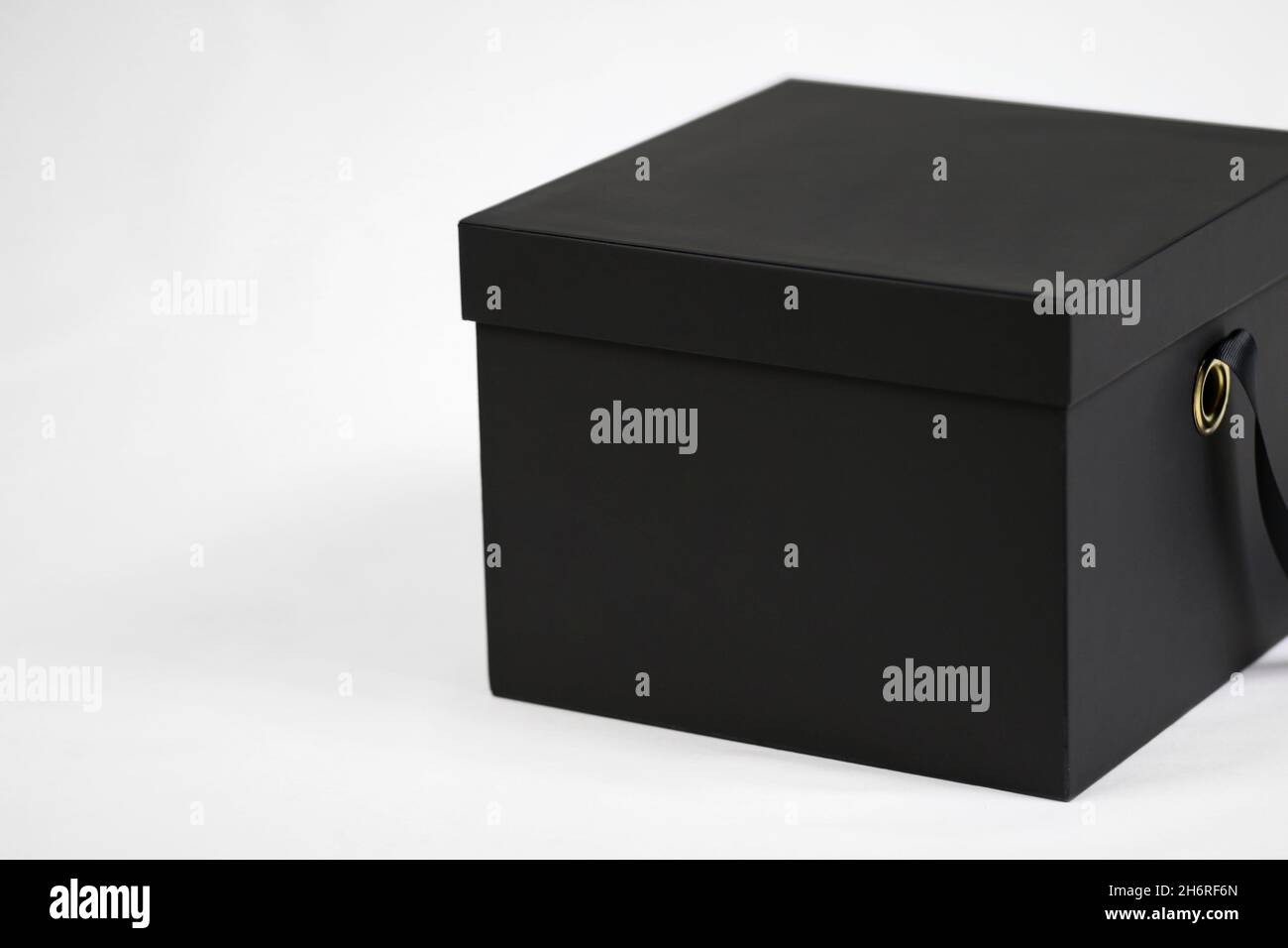 Black empty template square gift cardboard packaging box with closed ...