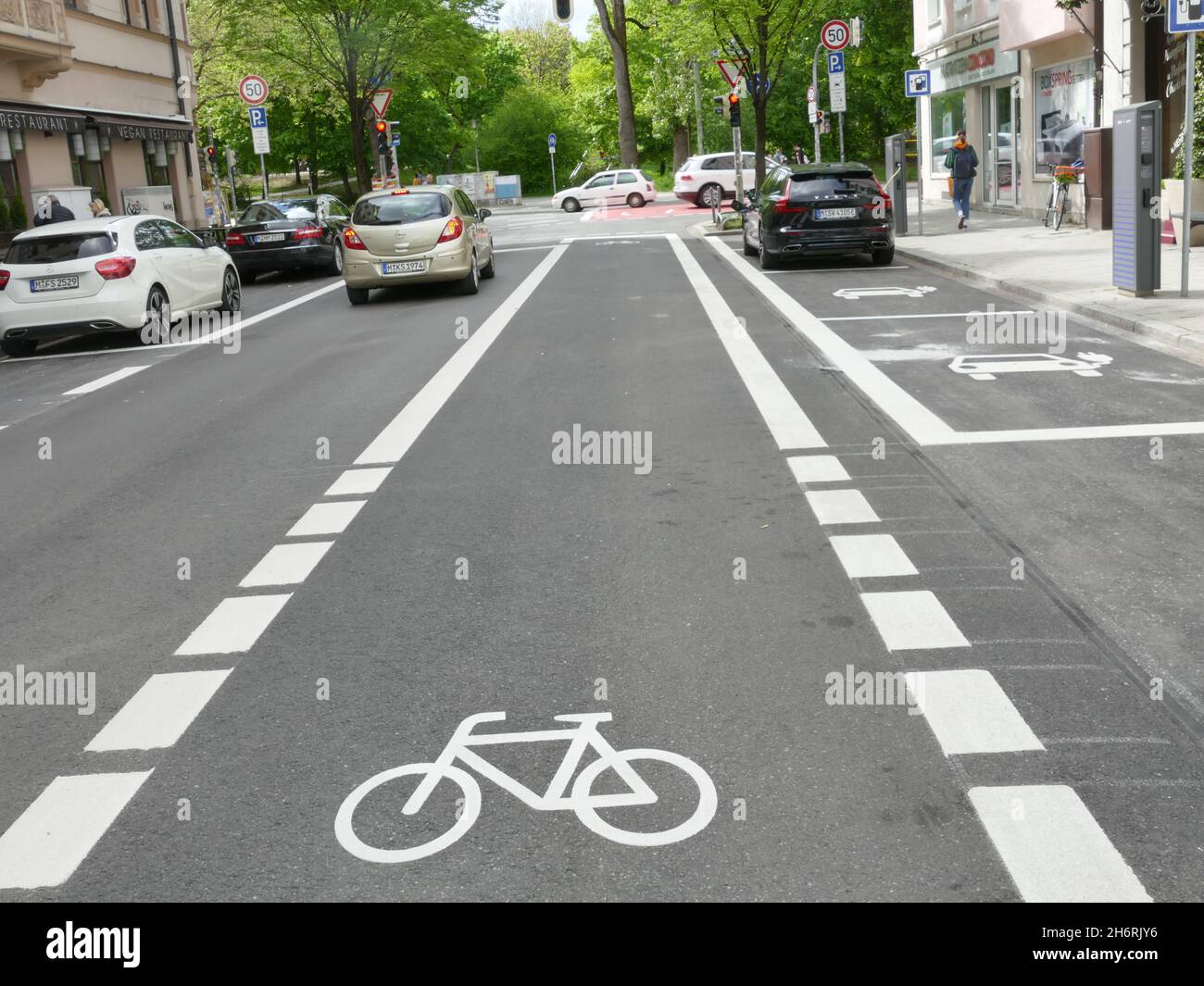 Pop up cycle path with large white bicycle symbol between two-lane ...