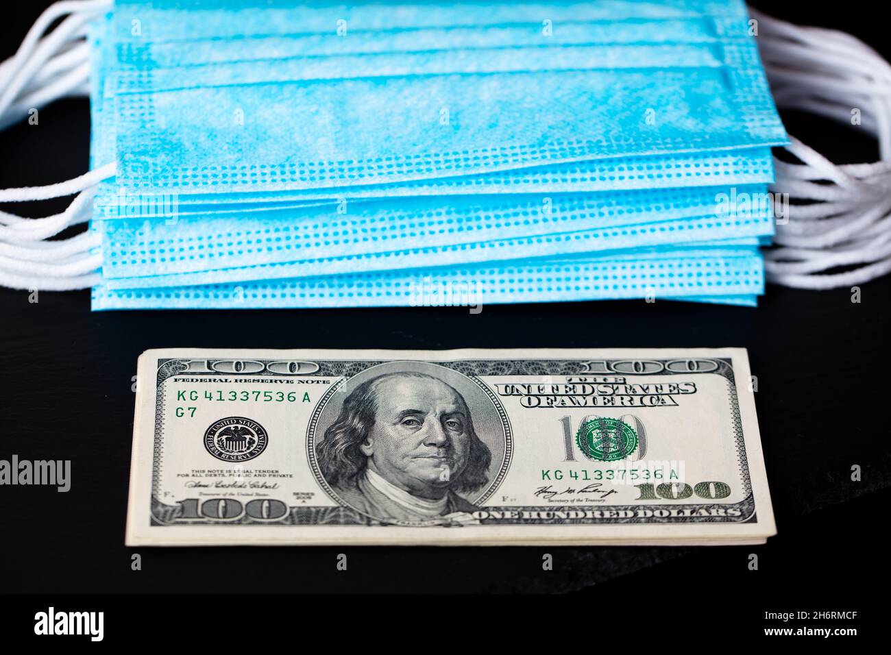Surgical masks dollar banknote hi-res stock photography and images - Alamy