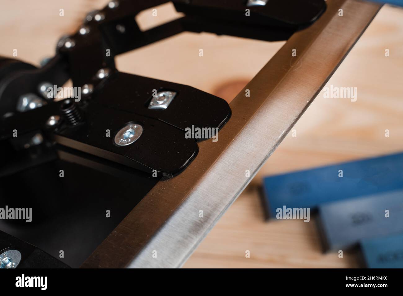 Professional knife set in sharpener for sharpening Stock Photo - Alamy
