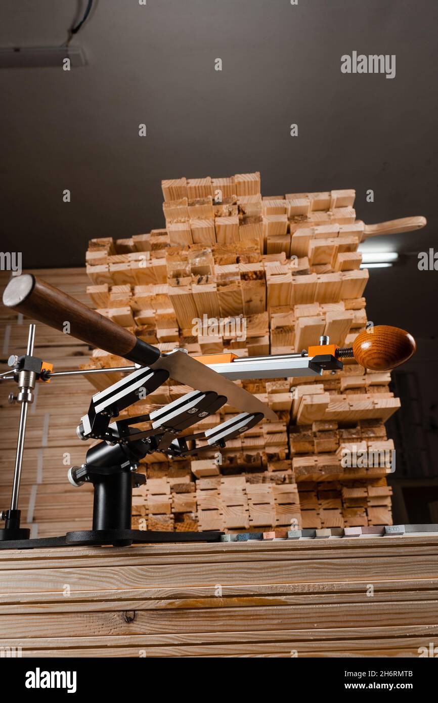 Sharpening knife process using professional sharpener with whetstone in ...