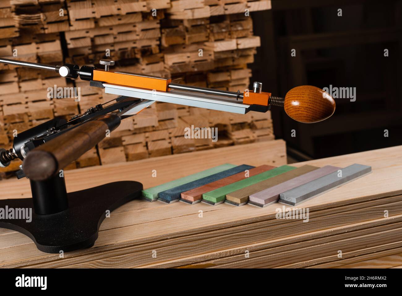 Sharpening knife process using professional sharpener with whetstone in ...