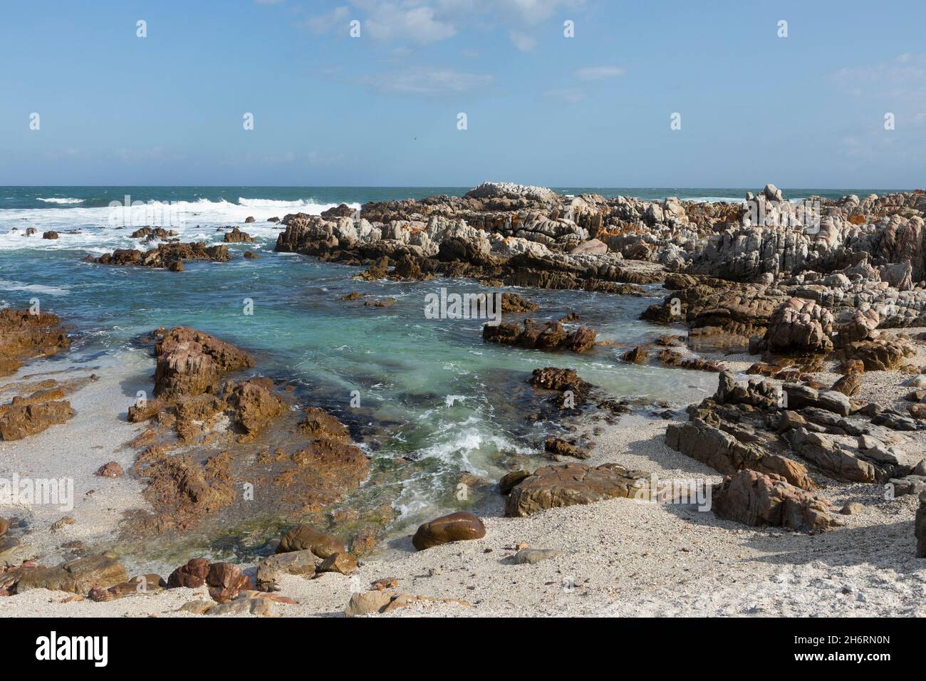 Rock pools and jagged coastline rocks on a beach, the Atlantic coast ...