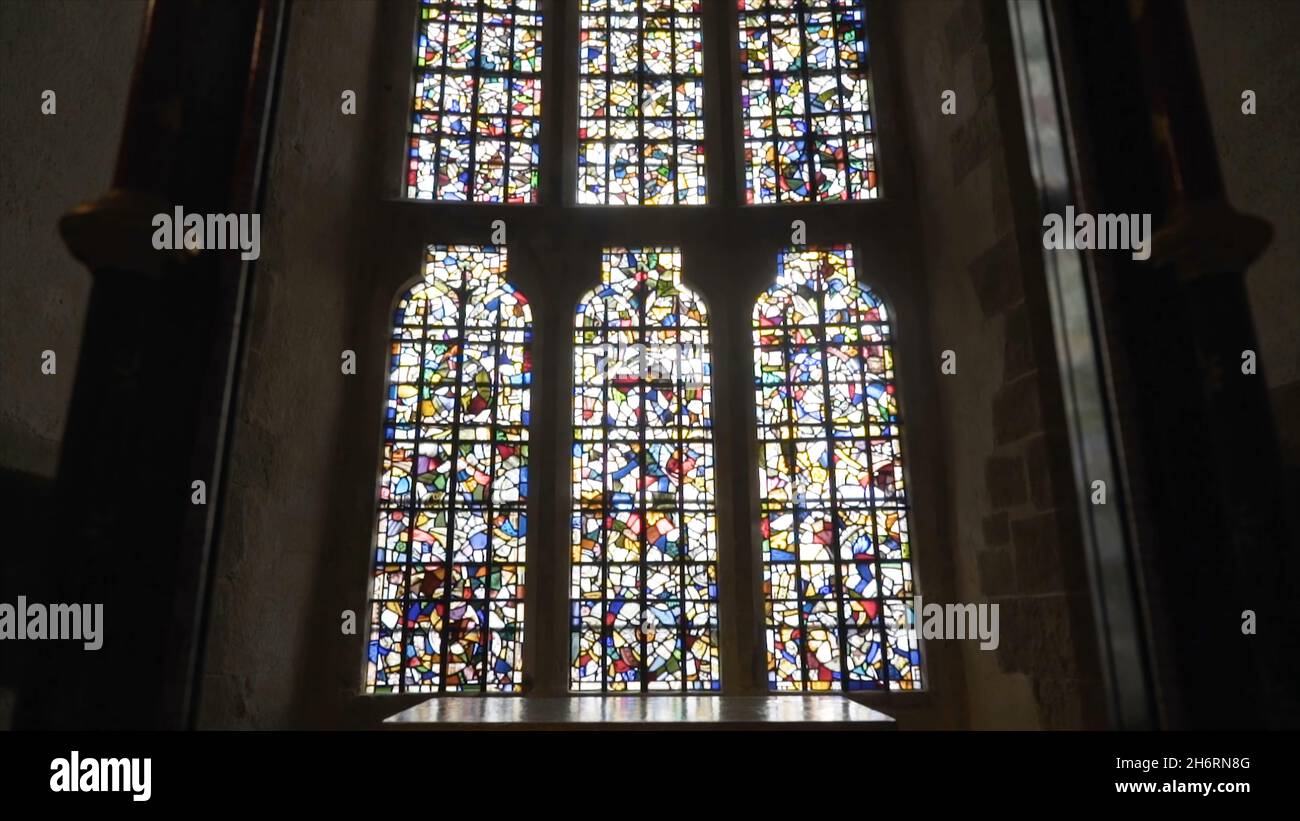 Stained glass Windows in old building. Action. Inside medieval building ...