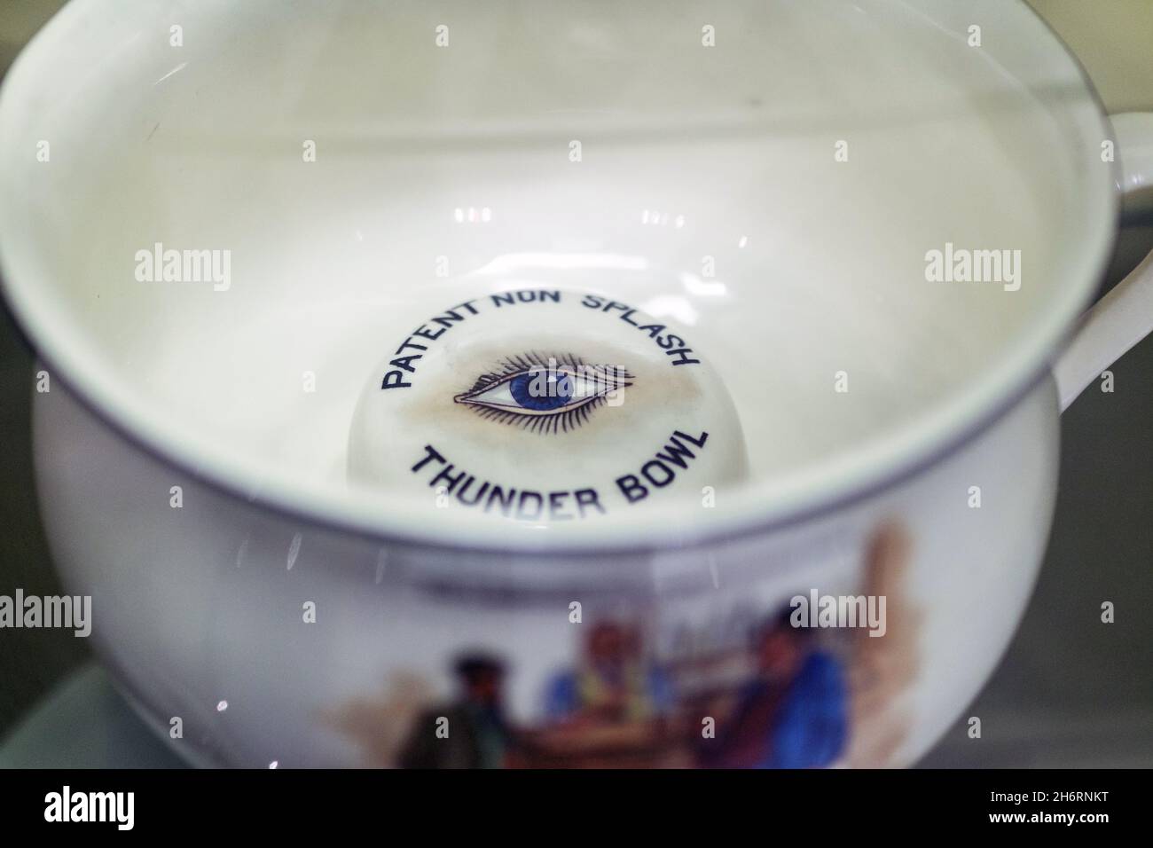 ceramic potty with eye motif and description in flushed with pride ...