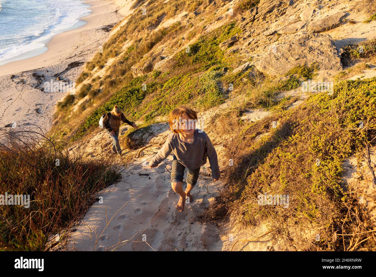 Young woman cliff path hi-res stock photography and images - Alamy