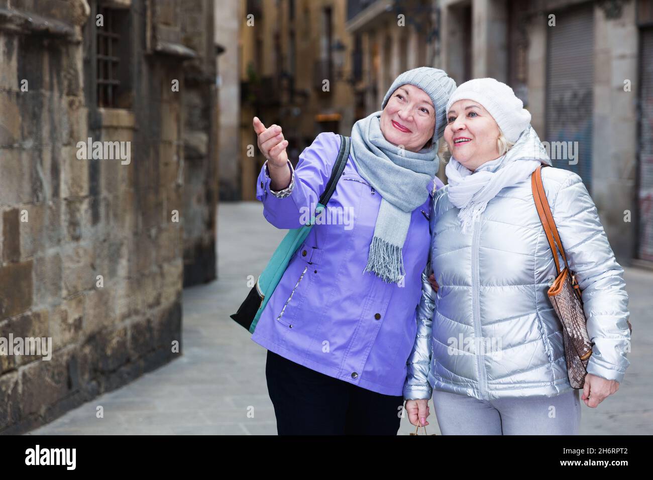 Elderly women walking around town Stock Photo - Alamy