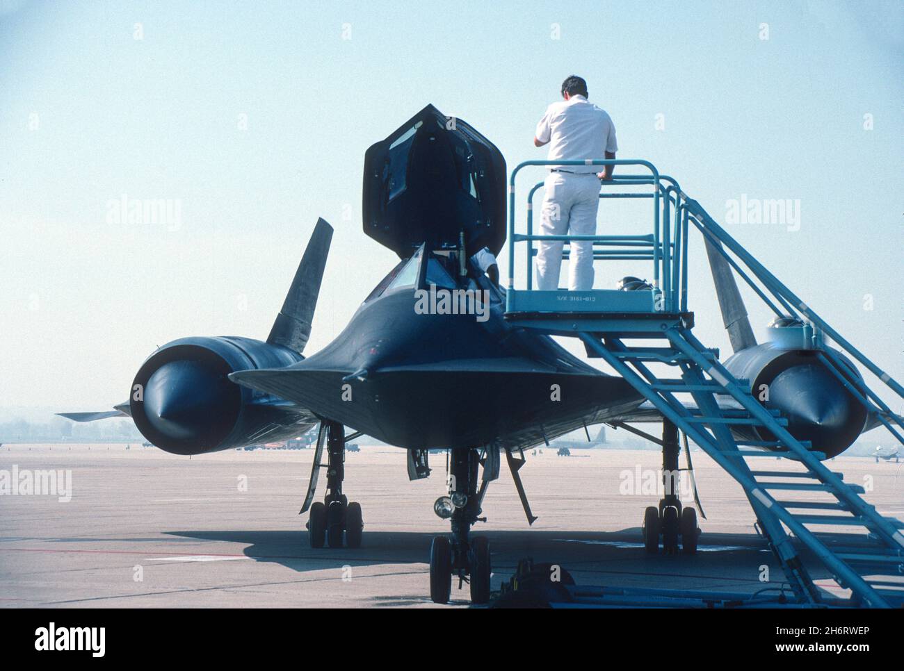 Support crew assisting SR-71 crew with exiting the aircraft after ...