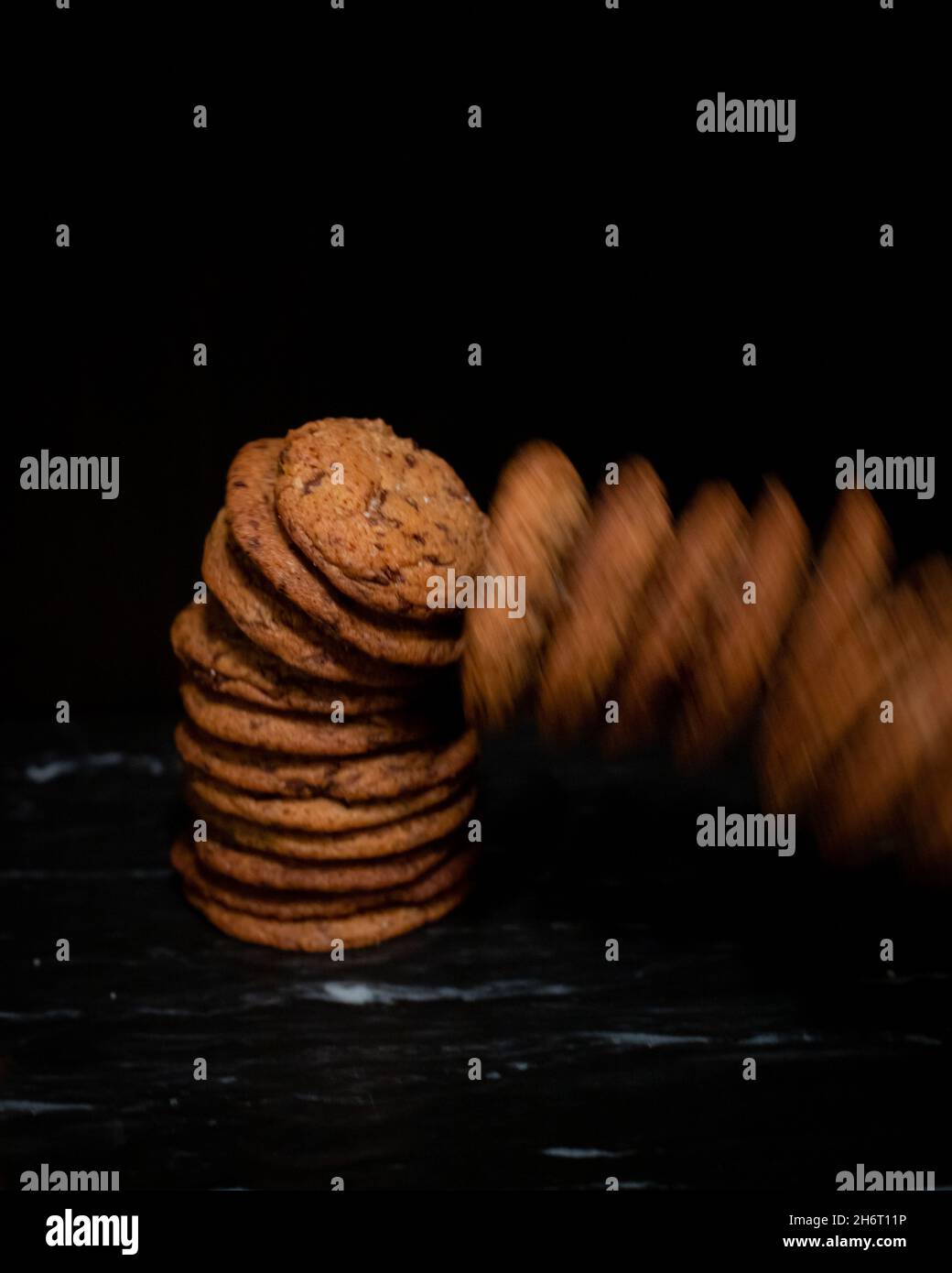 Chocolate Chip Cookies Falling Down Stock Photo - Alamy