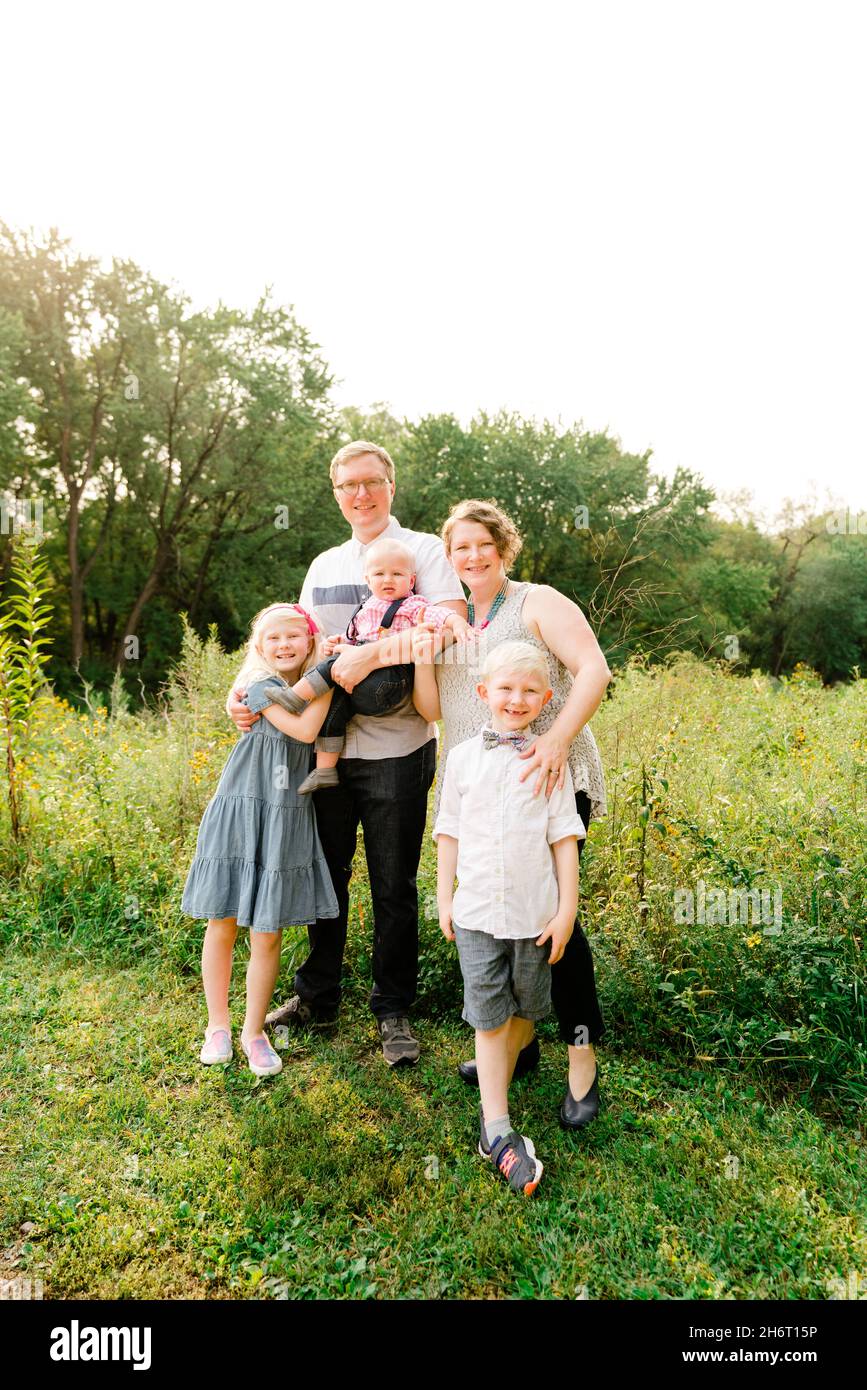 Outdoors portrait of a family of five Stock Photo - Alamy