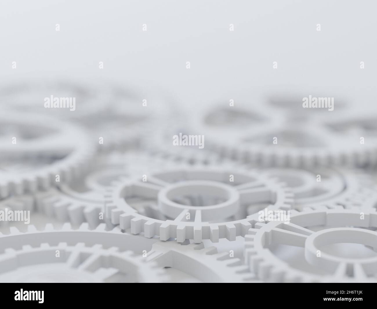 Precision engineering, concept background. Shiny steel gears on light ...