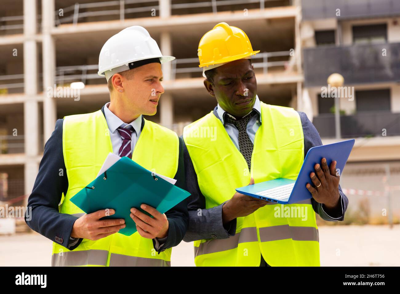 Head of construction and representative of developer are discussing ...