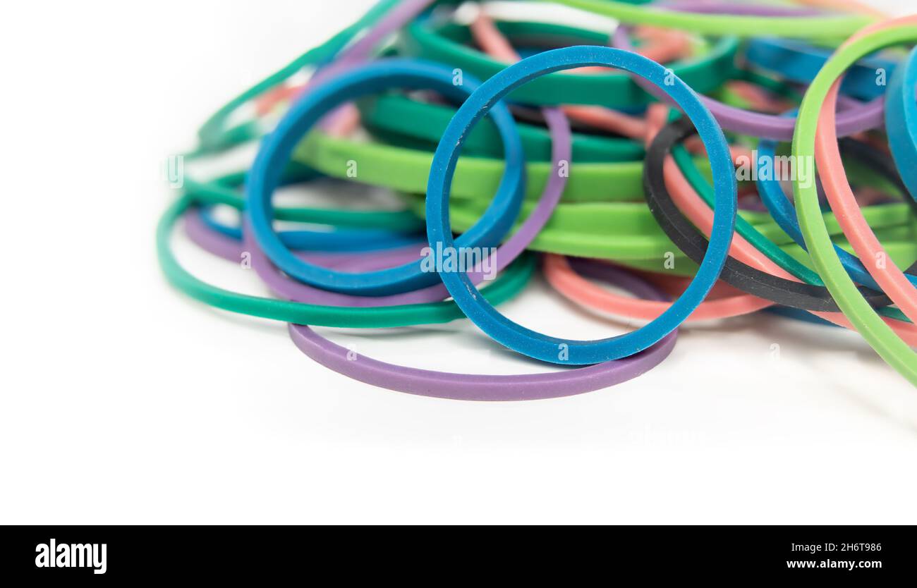 Pile of rubber bands or elastic loops in a variety of colors and sizes ...