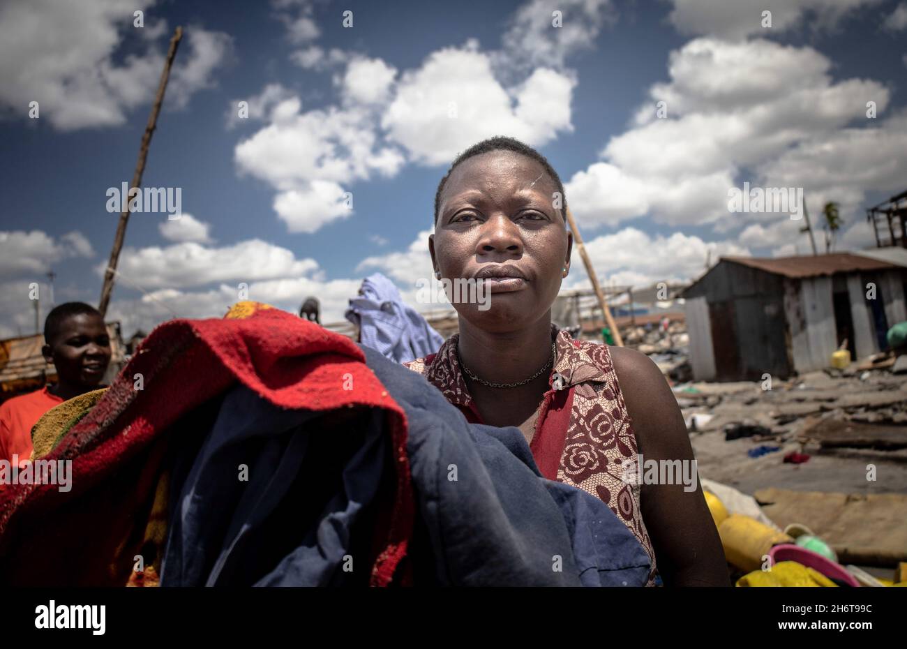 Nairobi, Kenya. 17th Nov, 2021. Homeless residents collect their ...