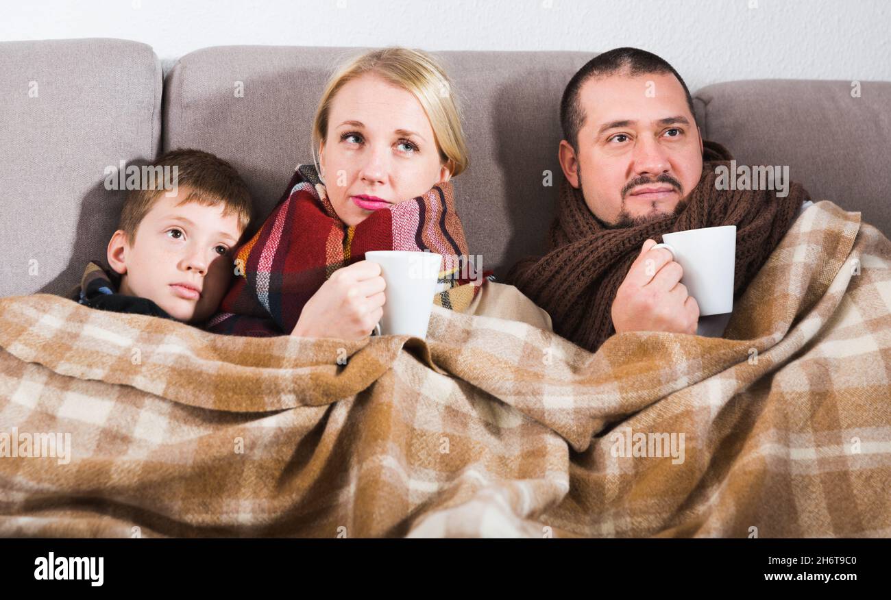 Family with son catching cold Stock Photo - Alamy