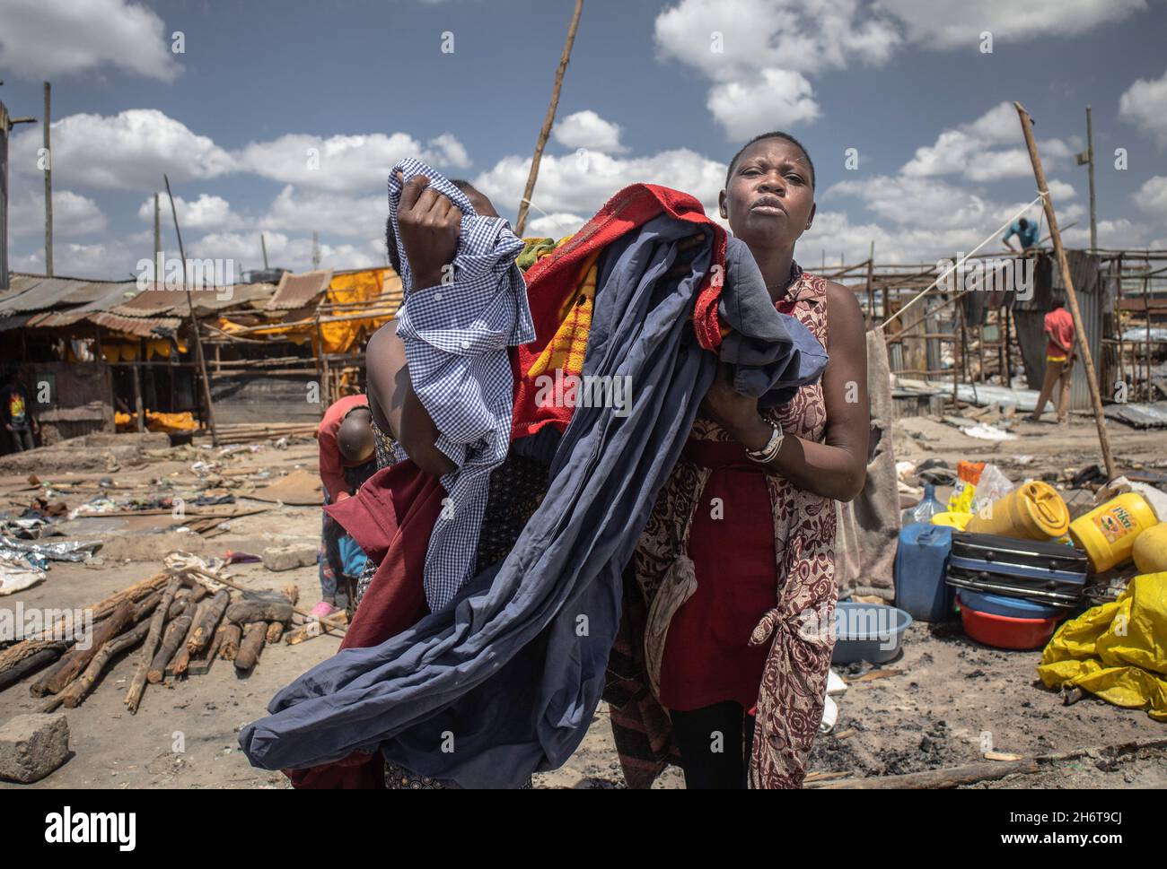 Nairobi, Kenya. 17th Nov, 2021. Homeless residents collect their ...