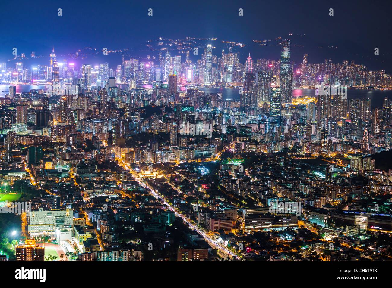 Nightscape of the Victoria Harbour and Kowloon area of Hong Kong. cyberpunk color tone Stock ...