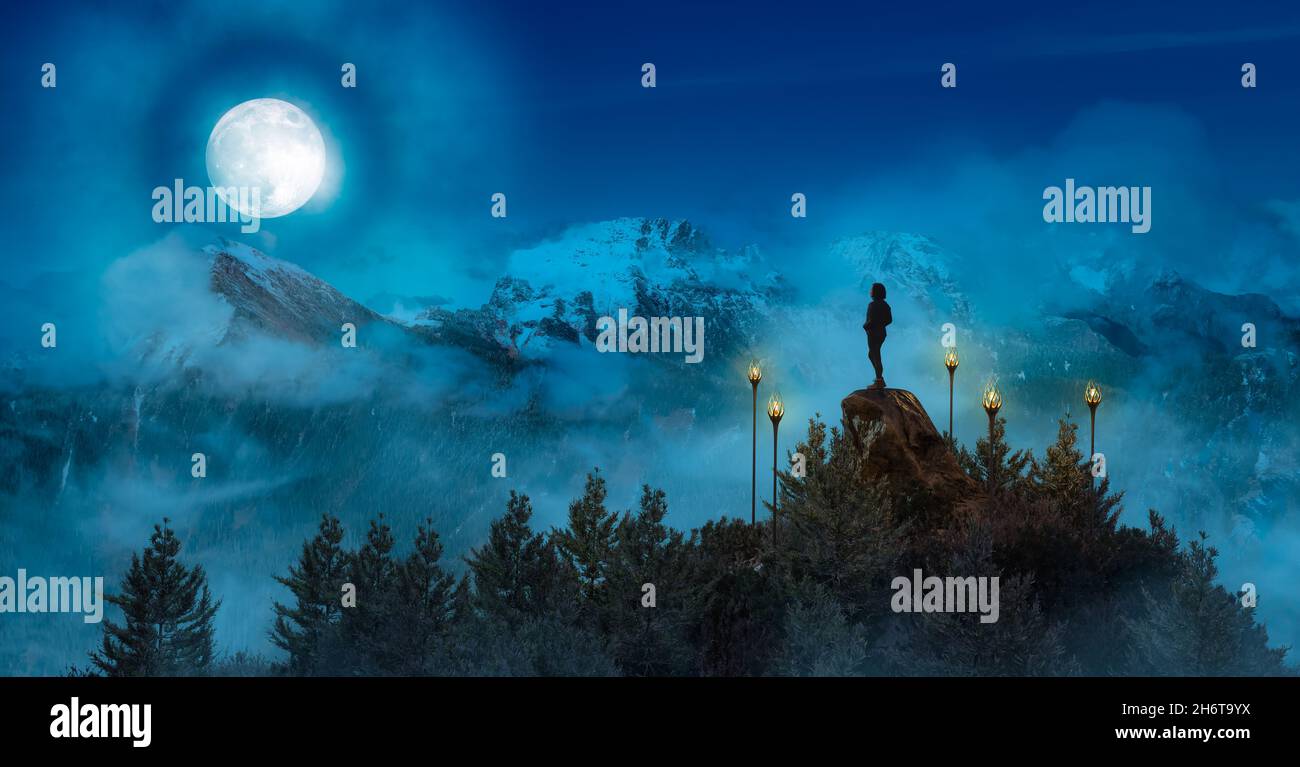 Magical night scene in nature. Mountain landscape with big moon in sky ...