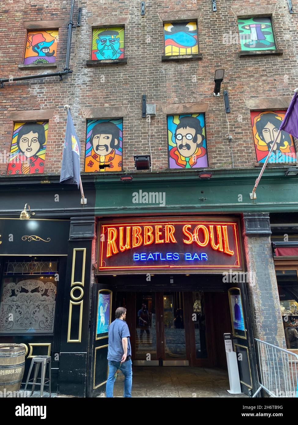 Liverpool, UK. 02nd Nov, 2021. A man enters the Beatles' pub Rubber ...