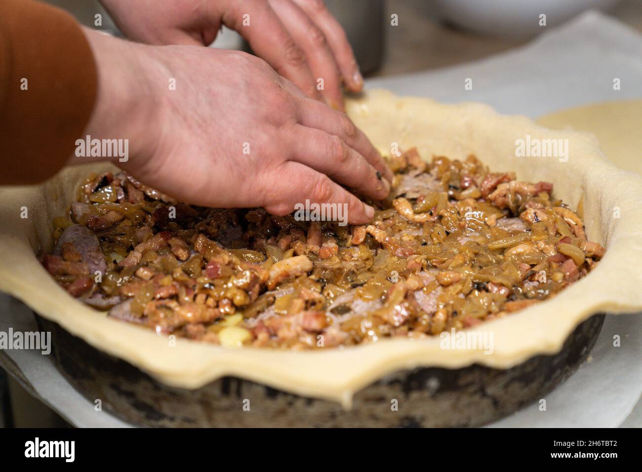 Closeup of preparing food in a store of a French traditional pork ...
