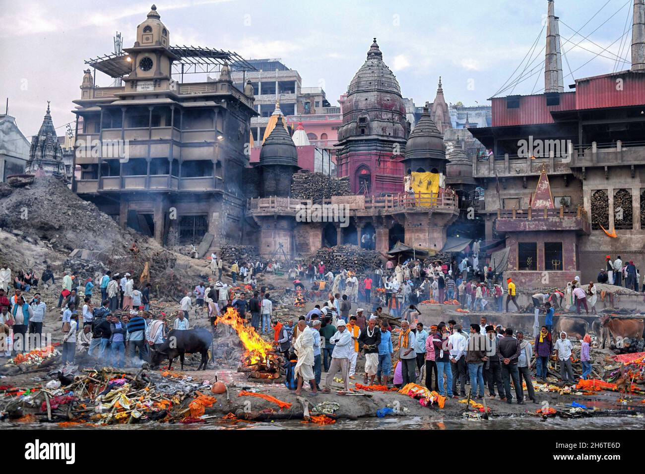 Varanasi, India. 17th Nov, 2021. A creamation seen going on beside the ...