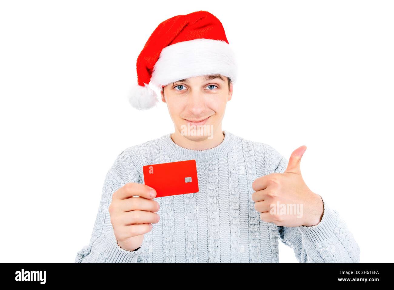Happy Young Man in Santa Hat with Empty Bank Card Isolated on the White ...