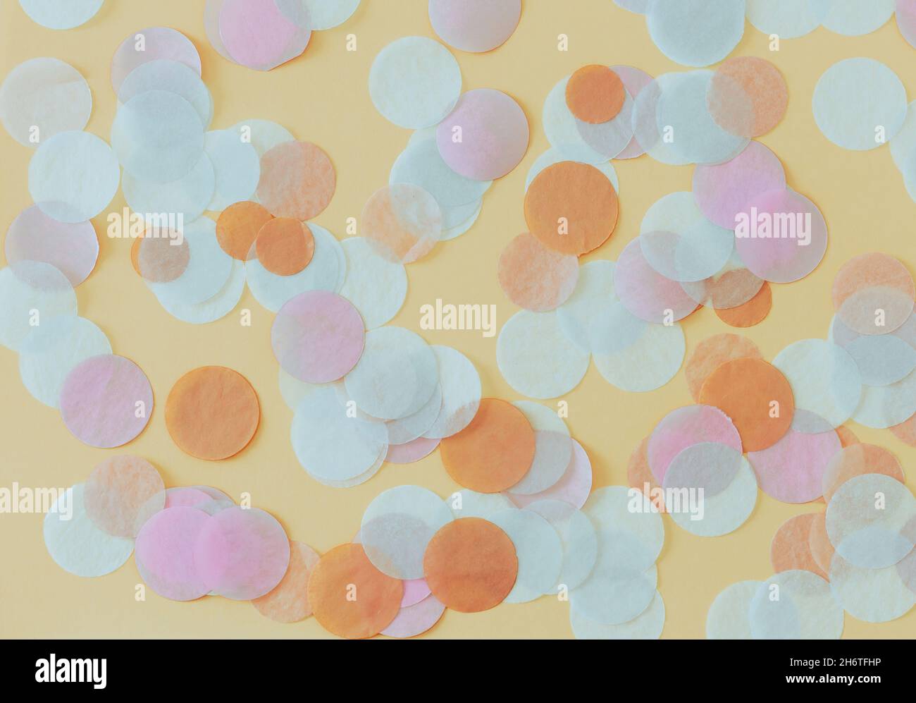 Colorful round paper party confetti background Stock Photo - Alamy