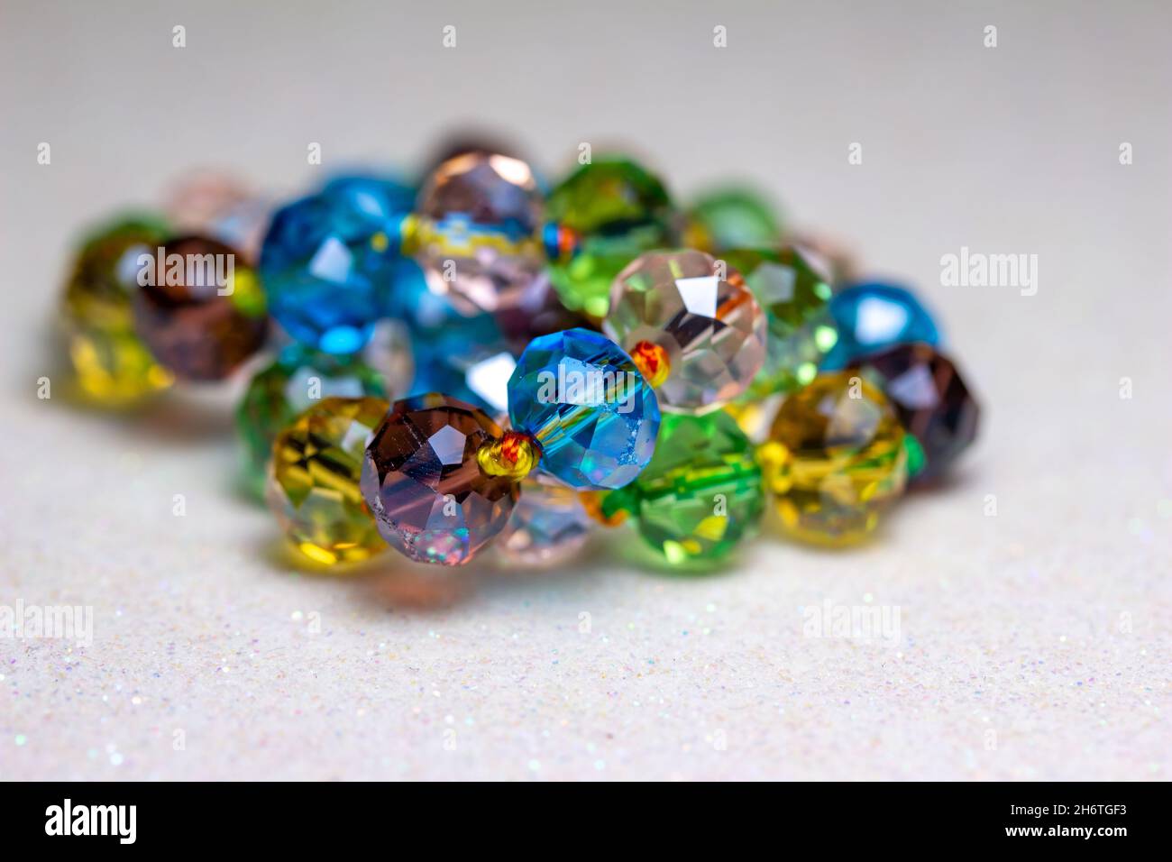 Macro abstract texture background of a string of defocused colorful ...