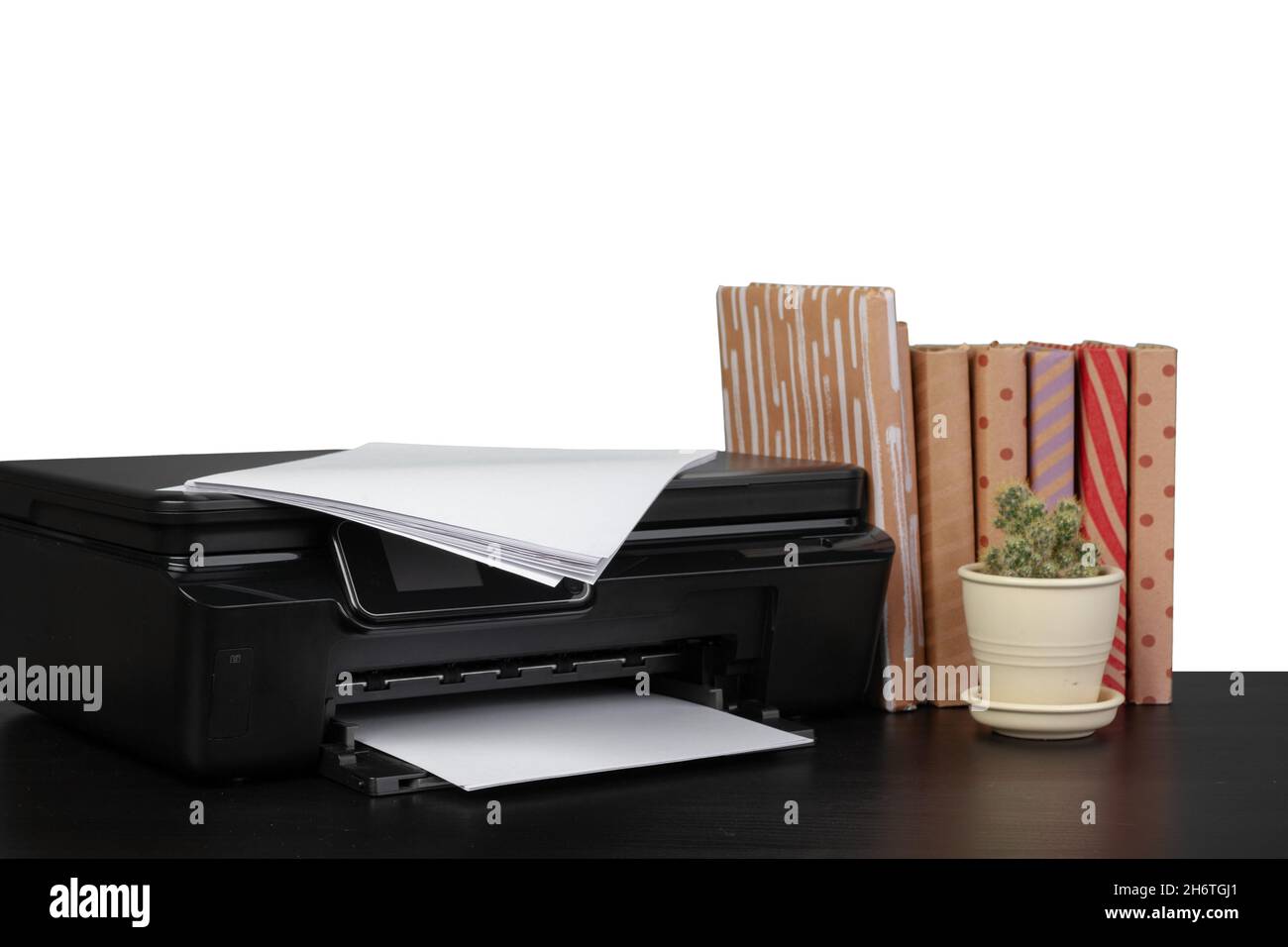 Office table with laser printer and books against white background ...