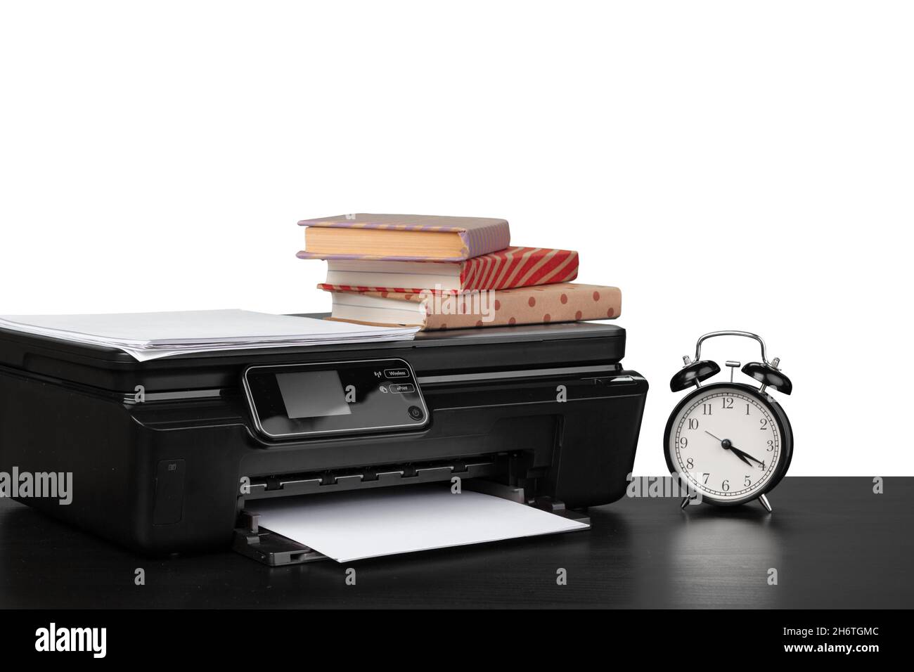 Working table with printer and stacked books on white abckground Stock ...